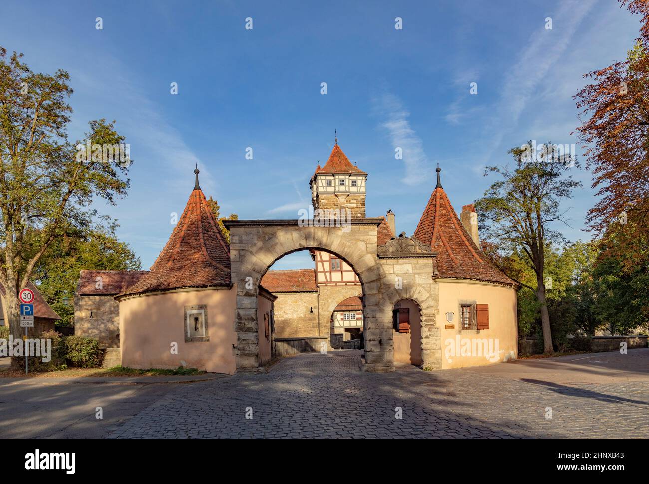 Roeder gate at the town wall gives entrance to Rothenburg ob der Tauber ...