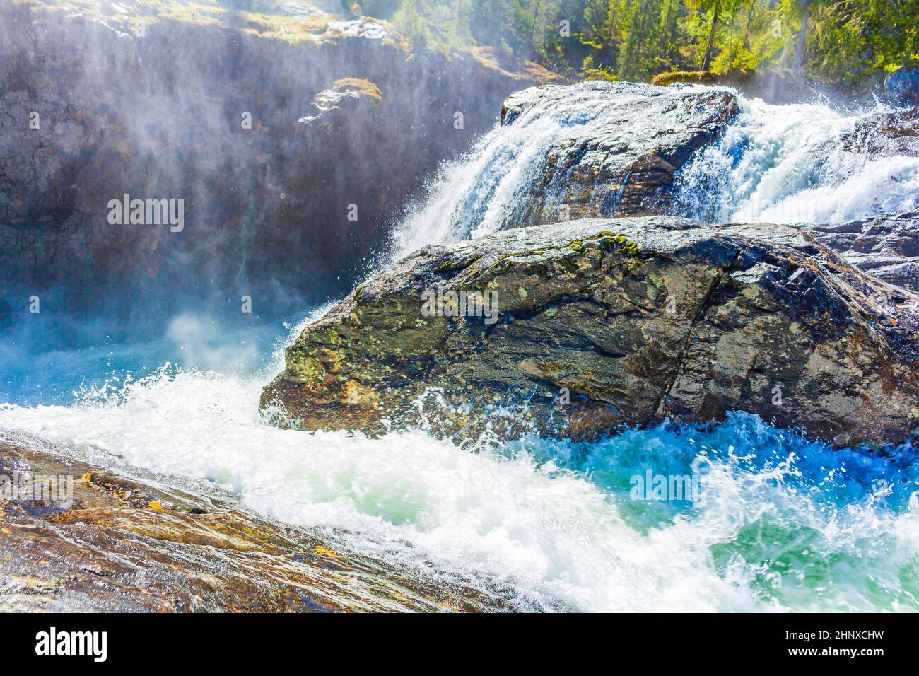 Fast flowing river water of the waterfall Rjukandefossen in Hemsedal ...