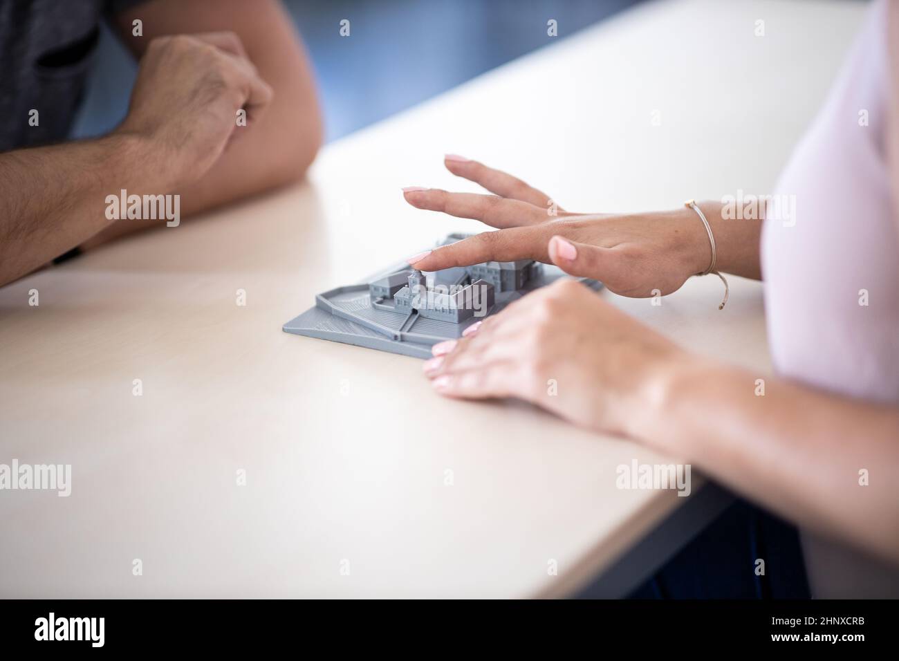 People with impaired vision using tactile maps, 3D models of town ...