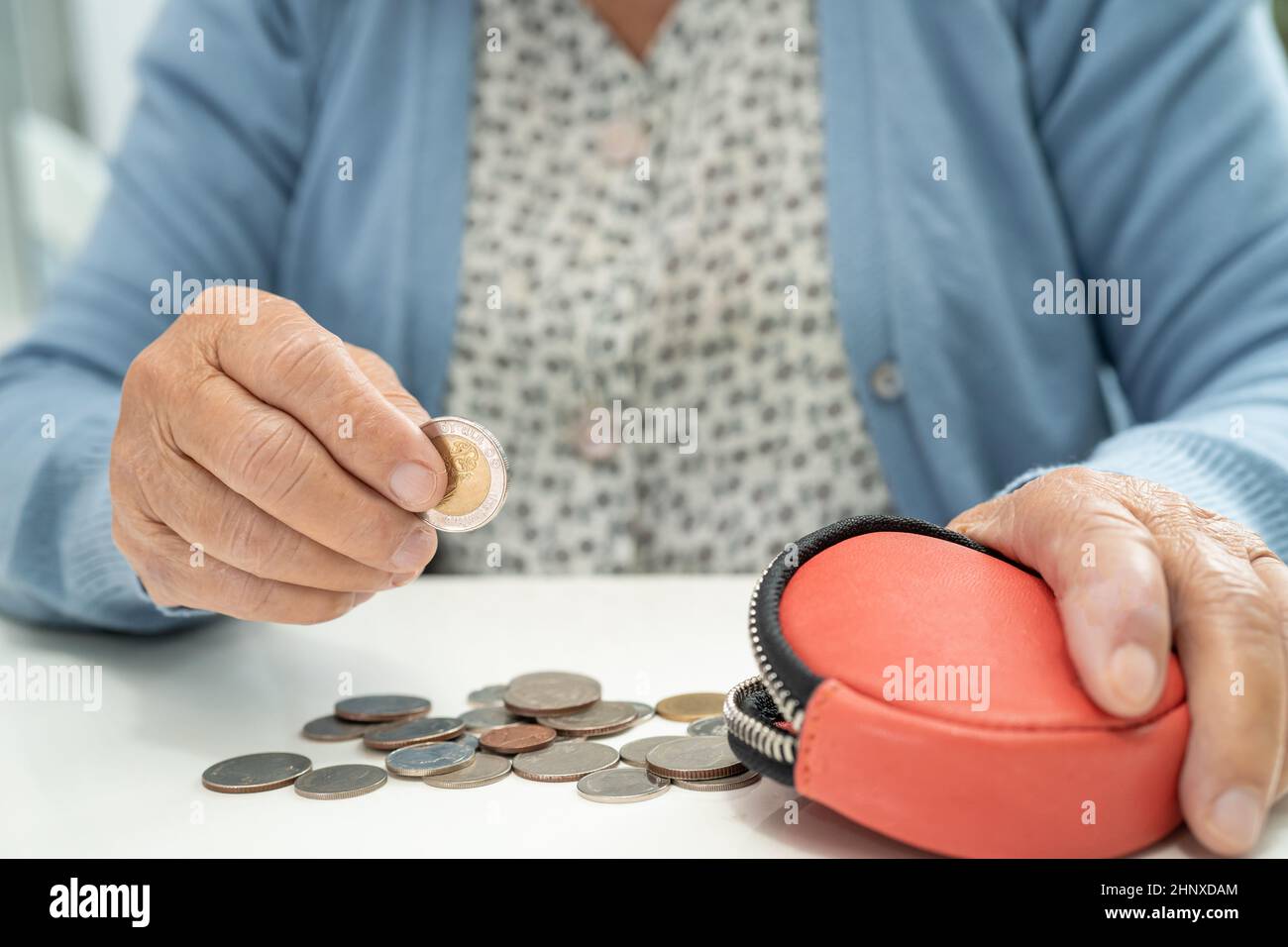 Old lady counting money hi-res stock photography and images - Alamy