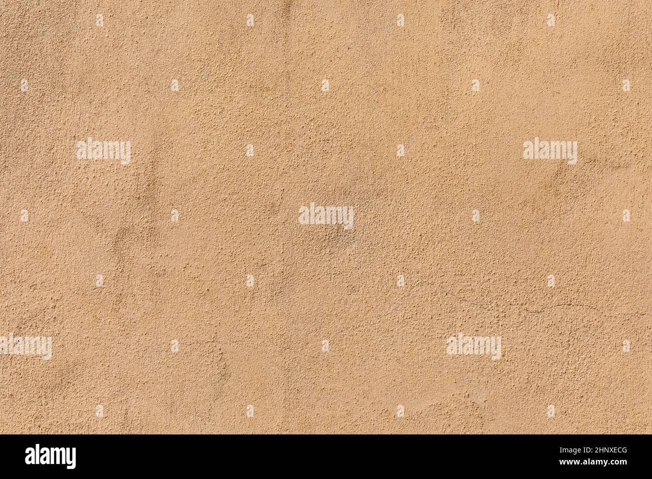 harmonic brown plaster wall background in detail Stock Photo - Alamy