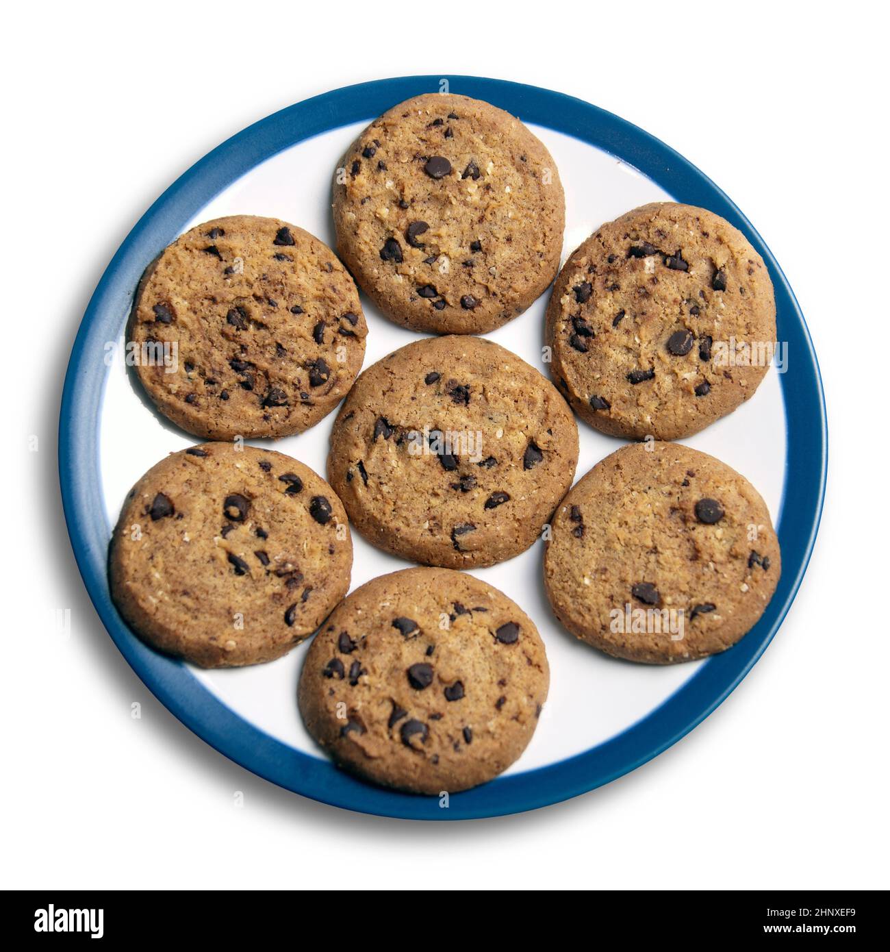 Seven chocolate chip cookies on a white and blue plate Stock Photo - Alamy
