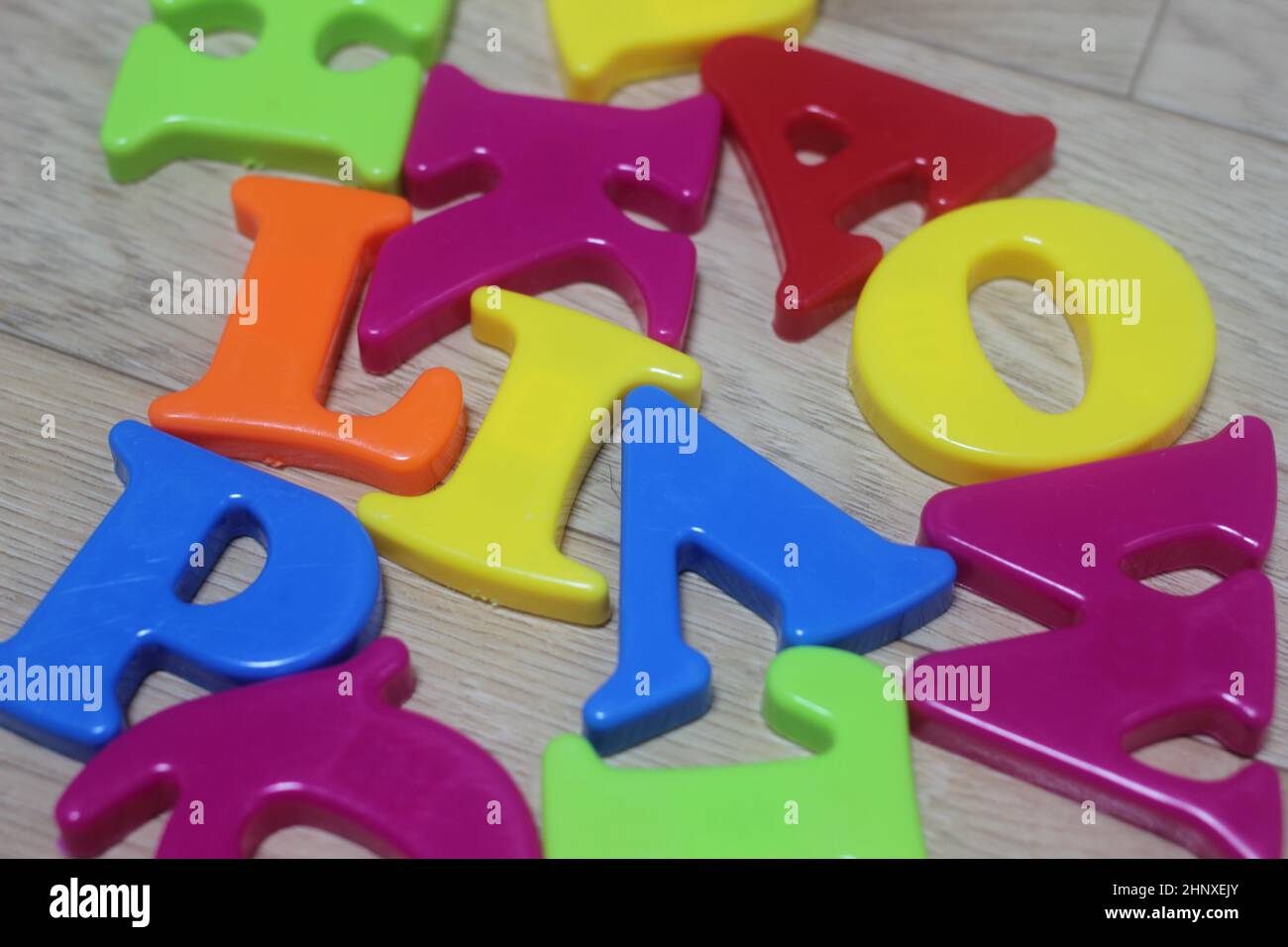 Colorful plastic alphabets hi-res stock photography and images - Alamy
