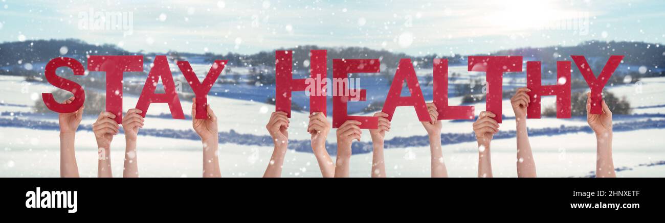 People Hands Holding Colorful English Word Stay Healthy. Snowy Winter ...