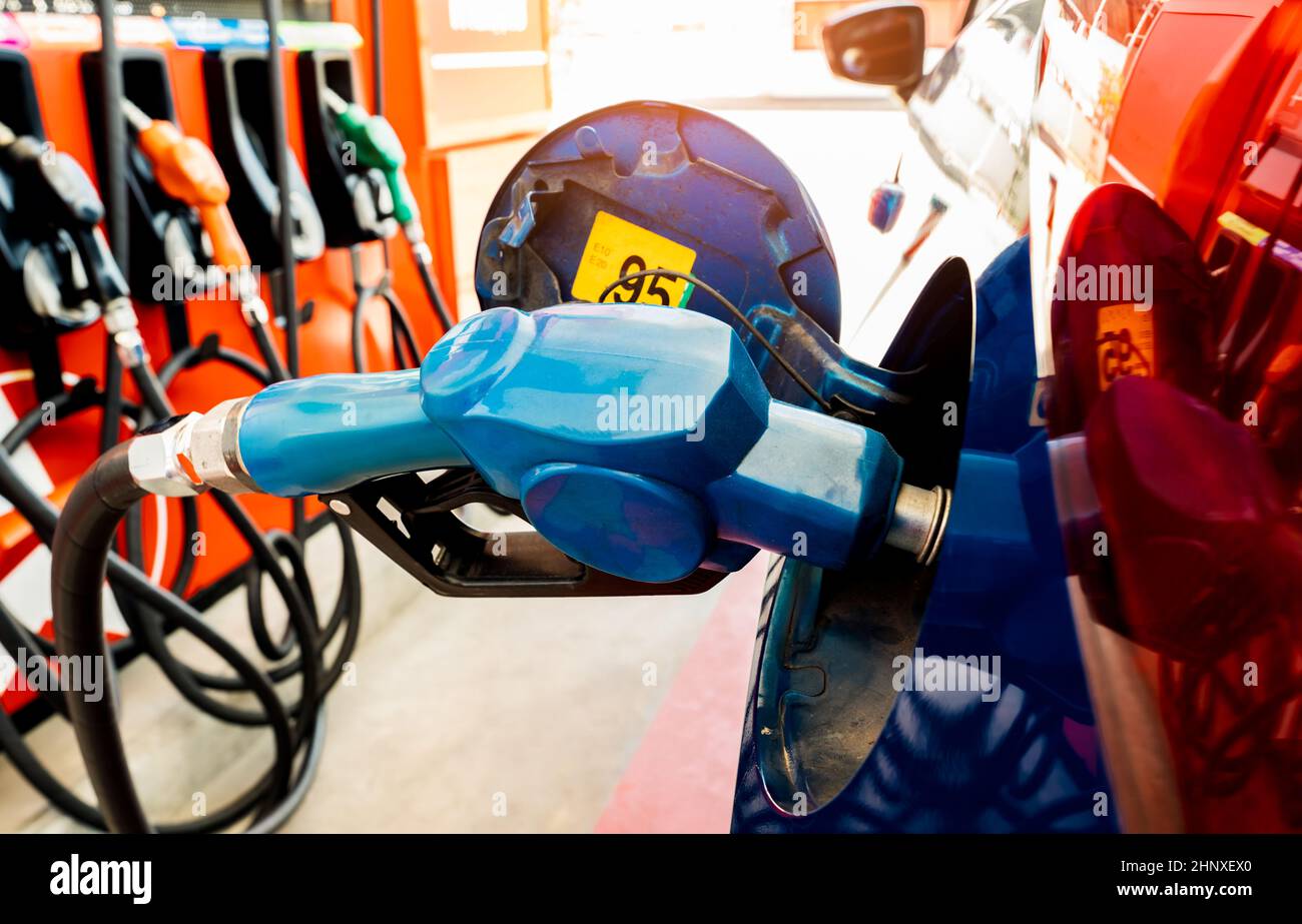 Car fueling at gas station. Refuel fill up with petrol gasoline. Petrol ...