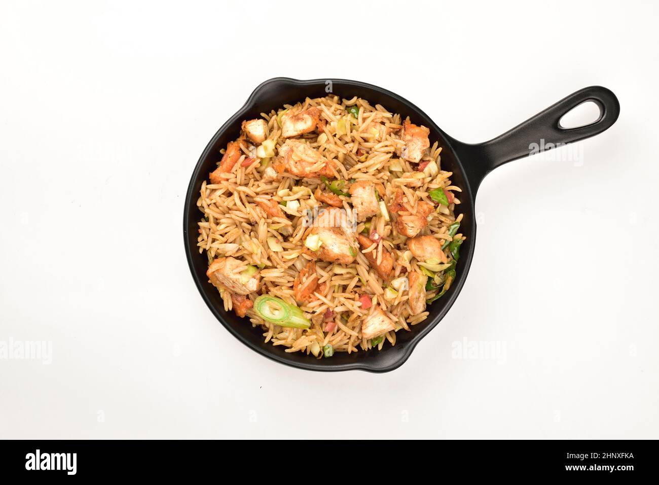 chicken fried rice in pan isolated on white background with clipping ...