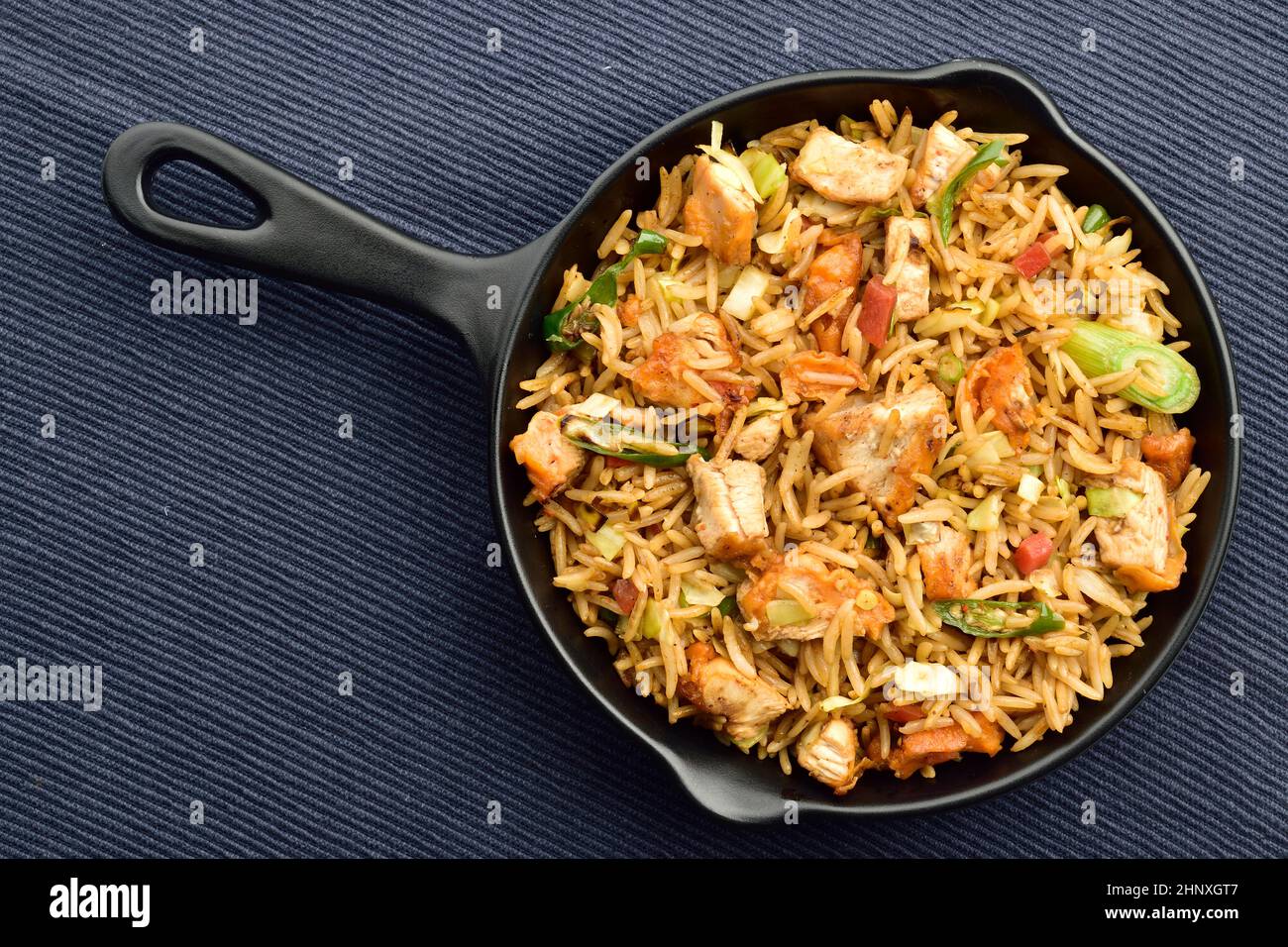 top view of chicken fried rice in pan Stock Photo - Alamy