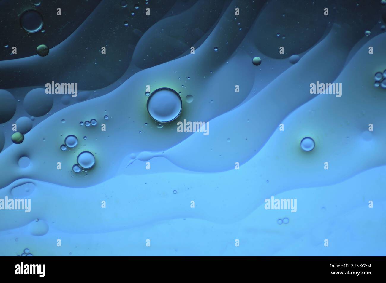 blue color liquid and bubbles moving background Stock Photo - Alamy