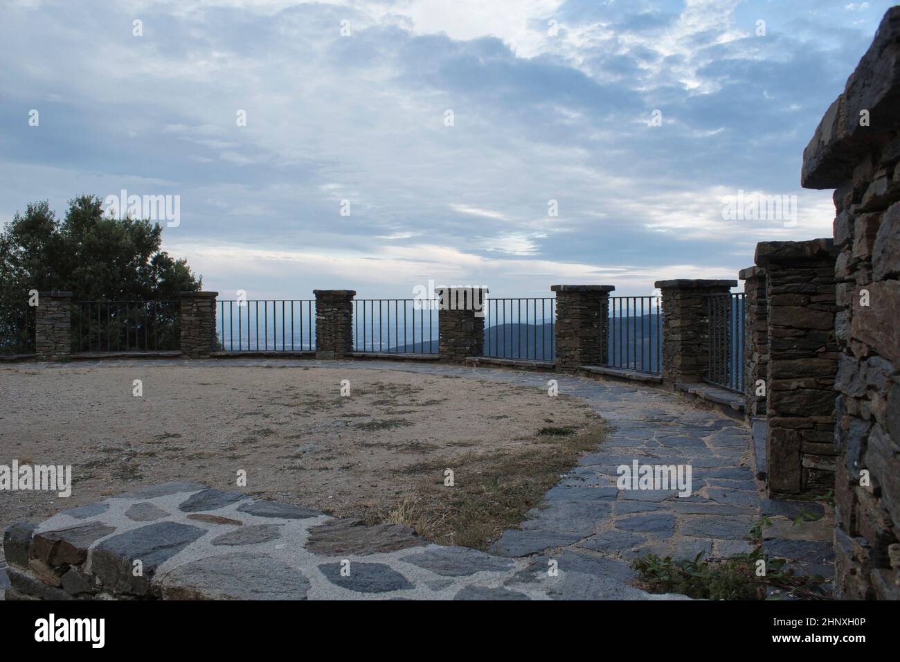 views of a cloudy sky from a stone vantage point in height Stock Photo ...