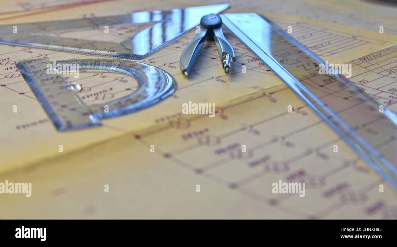 Electrical engineer workplace - electrotechnical project, rulers, and ...