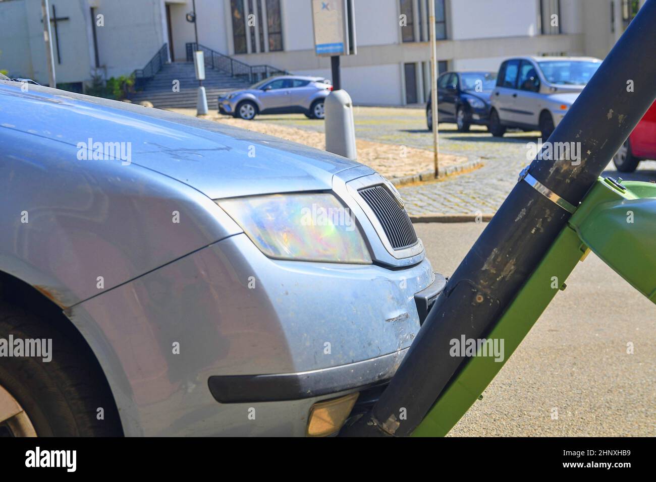 Car crashed into electricity pole. Damaged and broken electricity pole ...