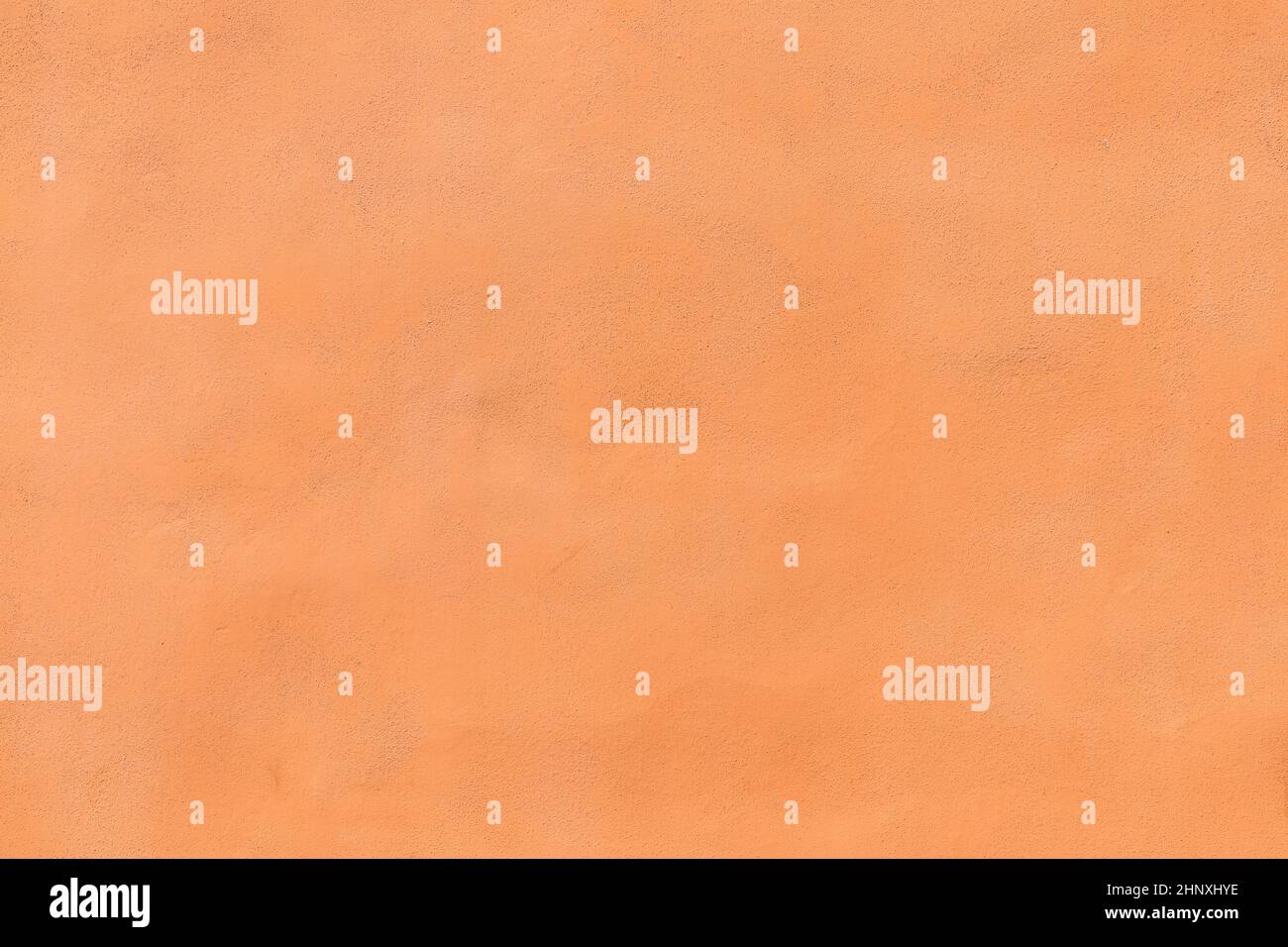 harmonic orange plaster wall background in detail Stock Photo - Alamy
