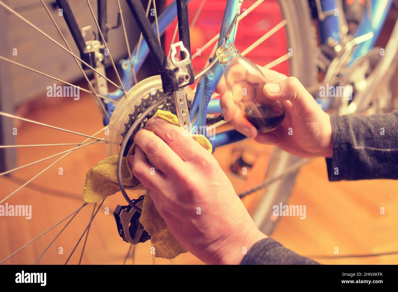 Male oiling bike hi-res stock photography and images - Alamy
