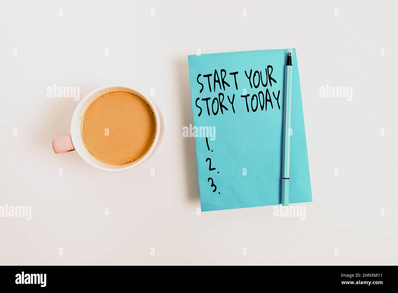 Conceptual caption Start Your Story Today, Word for work hard on ...
