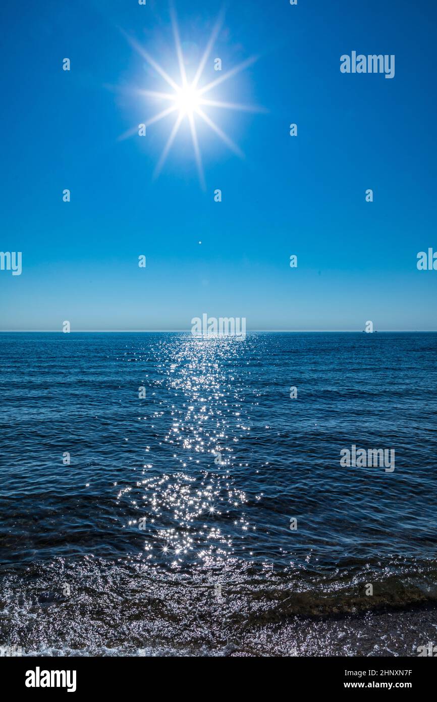 cape COD sun reflection in the ocean at midday Stock Photo - Alamy