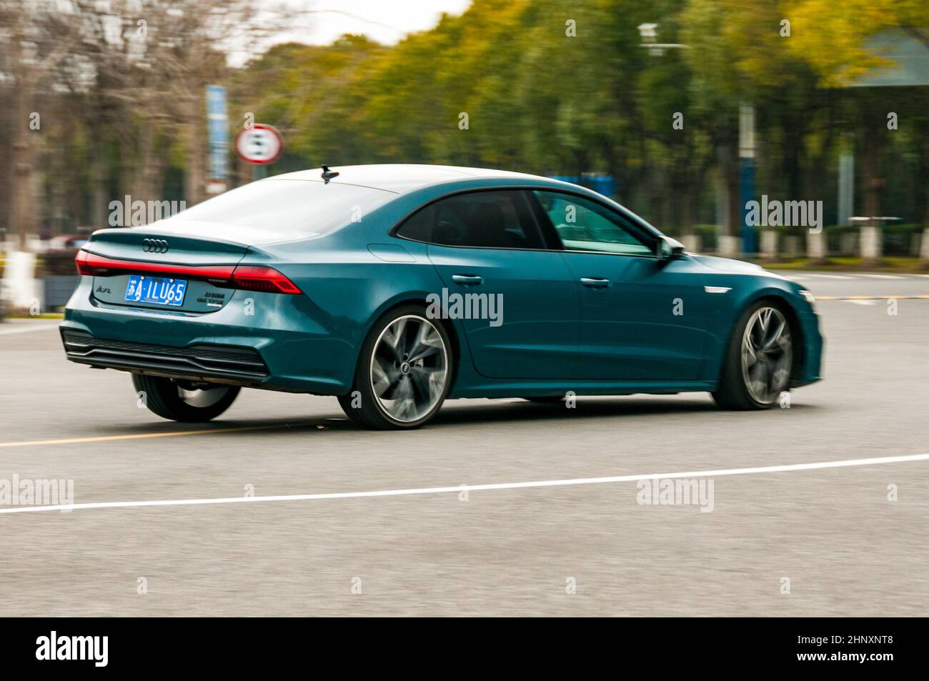 Audi A7L being driven on the road in Songjiang District, Shanghai ...