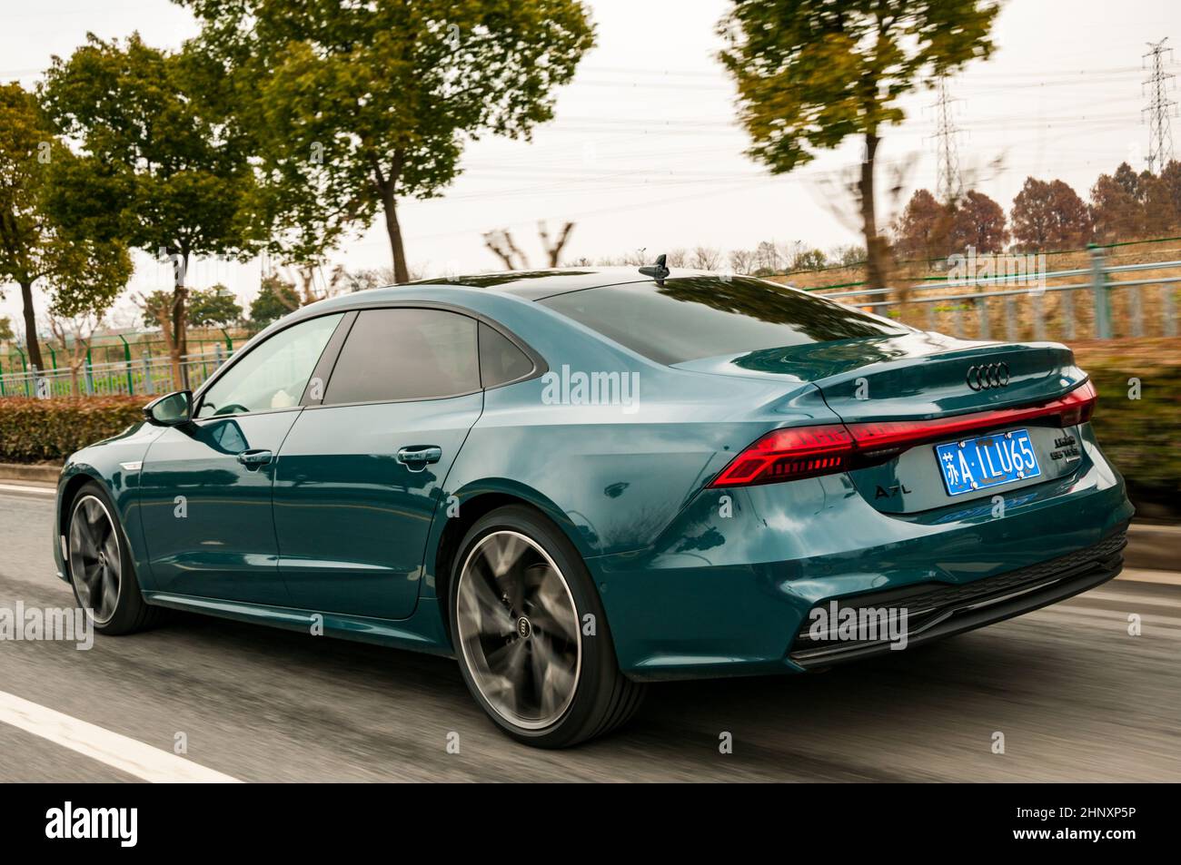 Audi A7L being driven on the road in Songjiang District, Shanghai ...