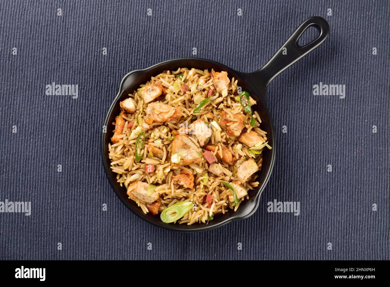 top view of chicken fried rice served in pan Stock Photo - Alamy