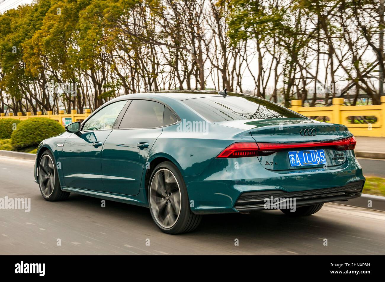 Audi A7L being driven on the road in Songjiang District, Shanghai, China Stock Photo - Alamy