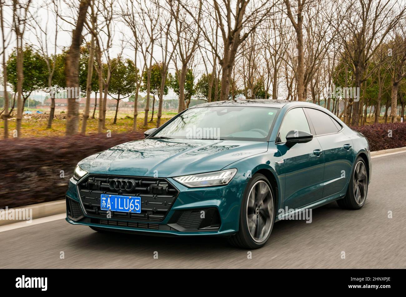 Audi A7L being driven on the road in Songjiang District, Shanghai ...