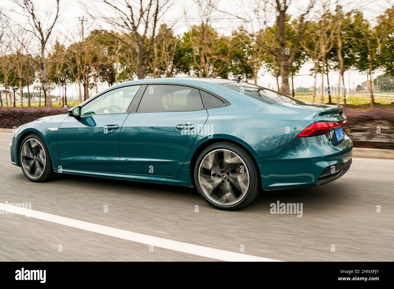 Audi A7L being driven on the road in Songjiang District, Shanghai ...