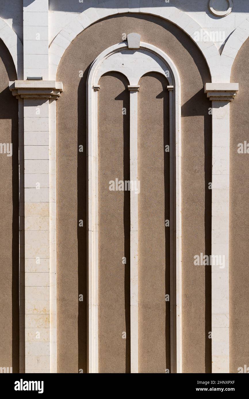 front view closeup of architectural decorative stone arch on public ...