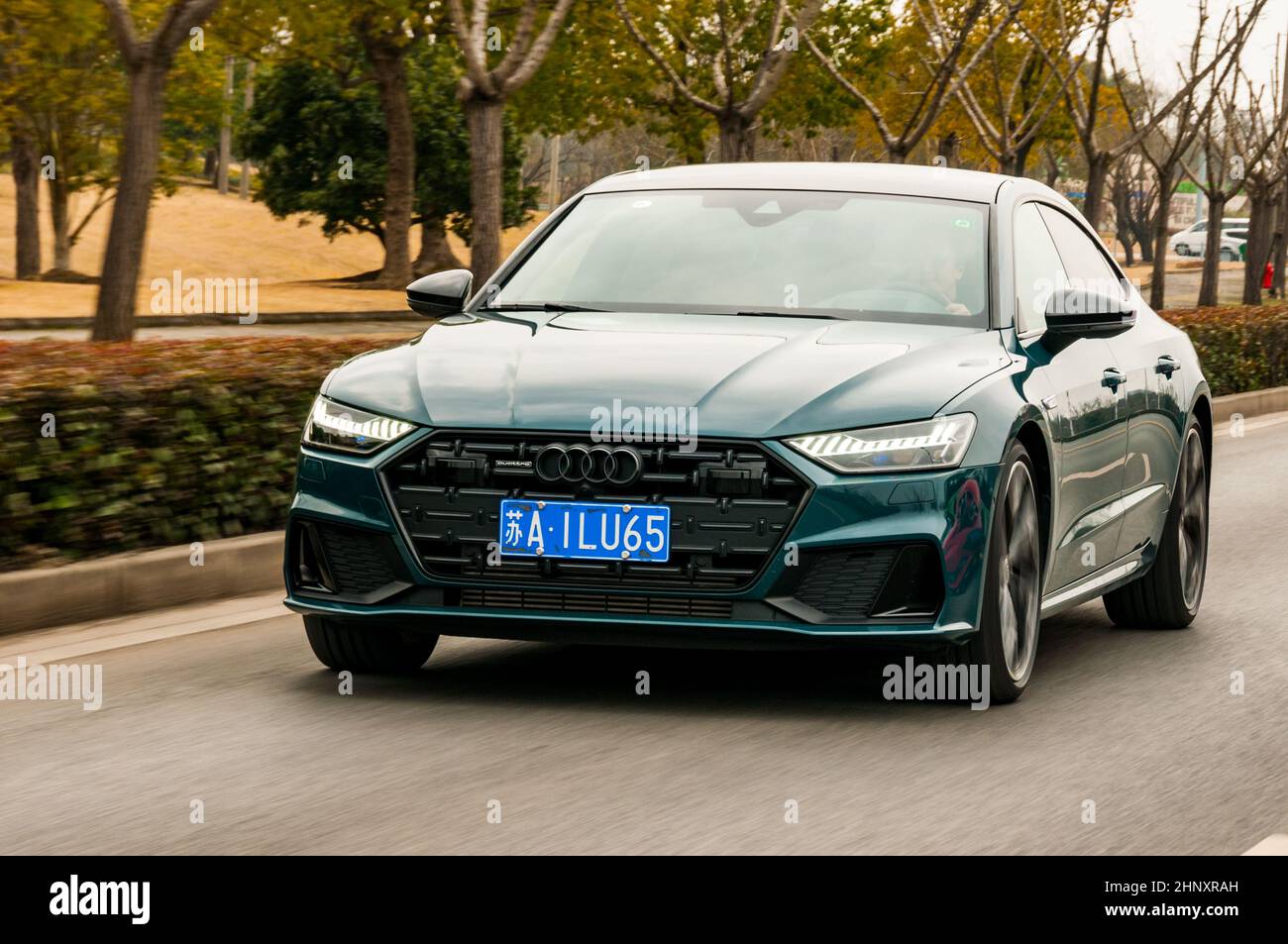 Audi A7L being driven on the road in Songjiang District, Shanghai ...
