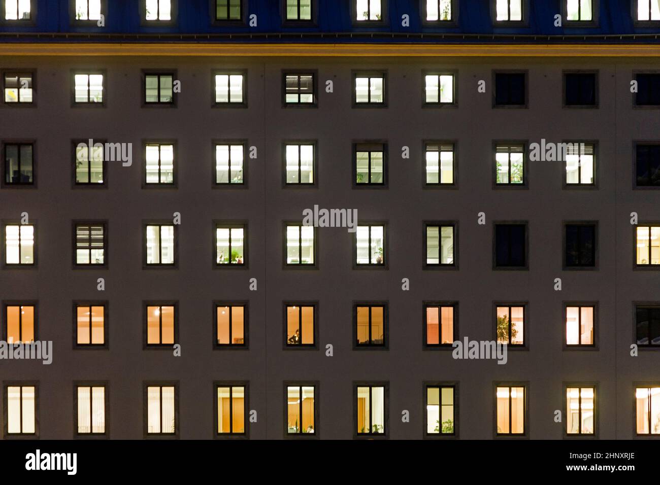 illuminated windows in a facade of a goverment building in Vienna ...