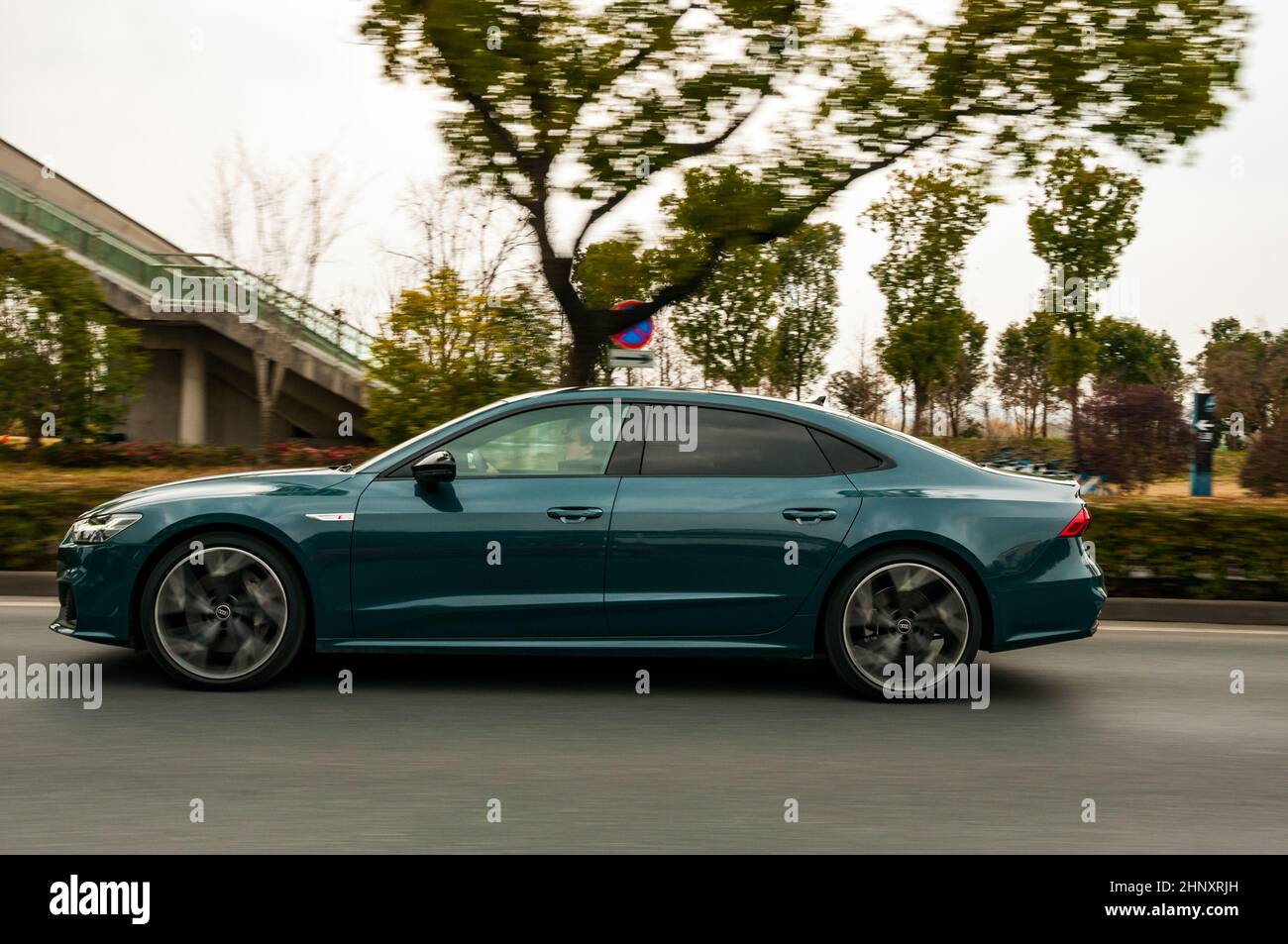 Audi A7L being driven on the road in Songjiang District, Shanghai ...