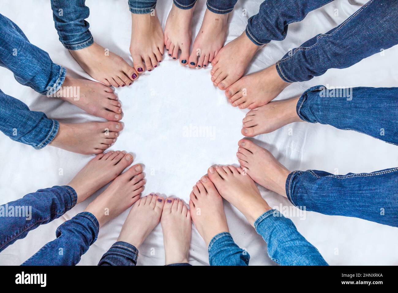 Feet together in circle hi-res stock photography and images - Alamy