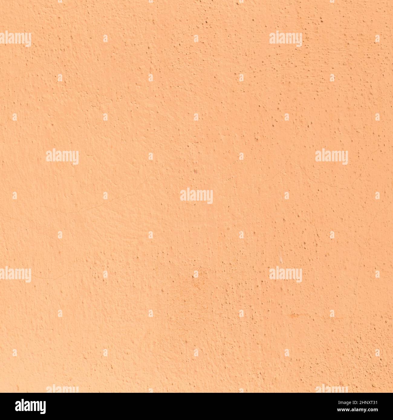 soft orange wall background in uni color Stock Photo - Alamy