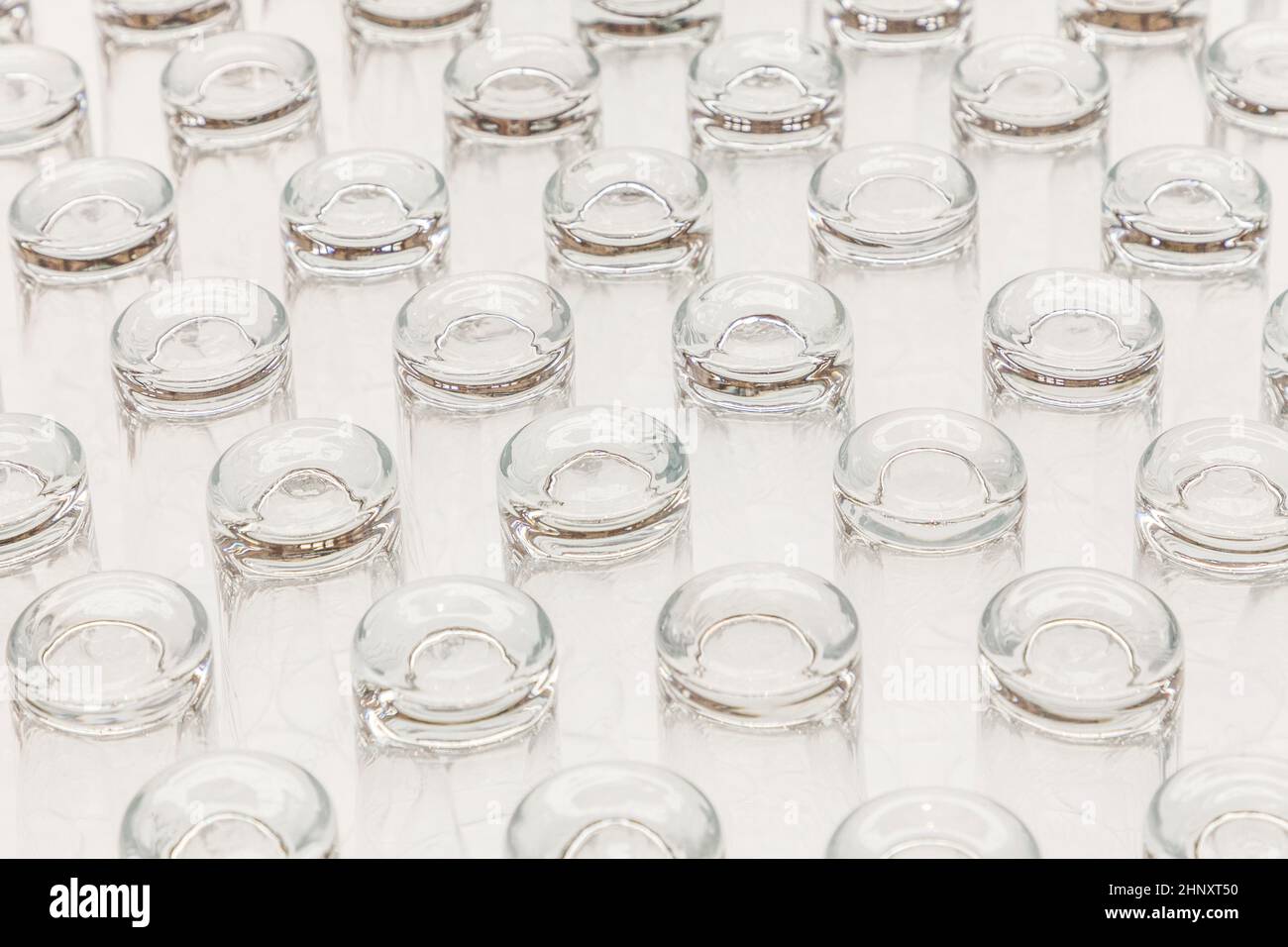 many empty glasses isolated on white background Stock Photo - Alamy