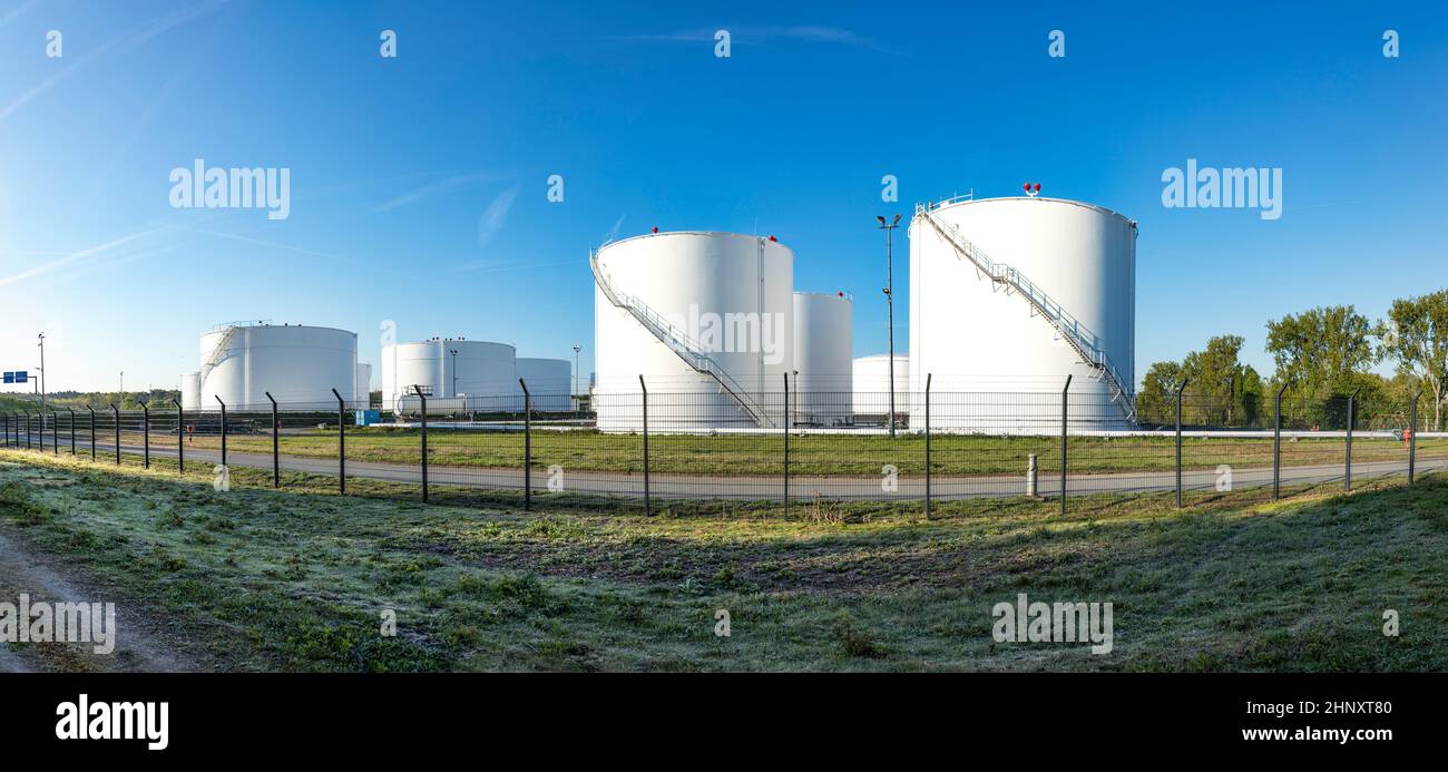 huge white silos in a silo farm with petrol Stock Photo - Alamy