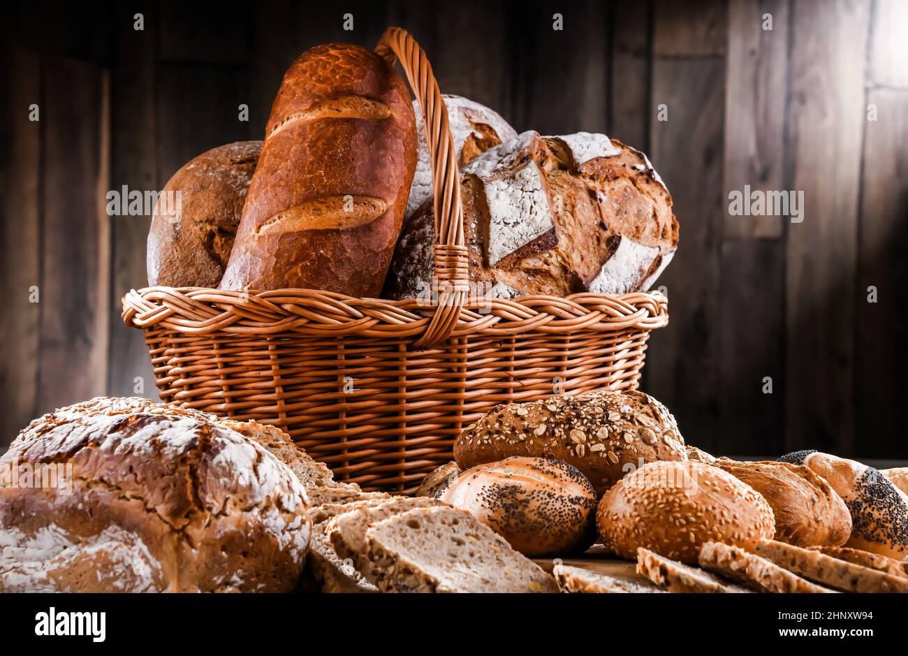 Assorted bakery products including loafs of bread and rolls Stock Photo ...