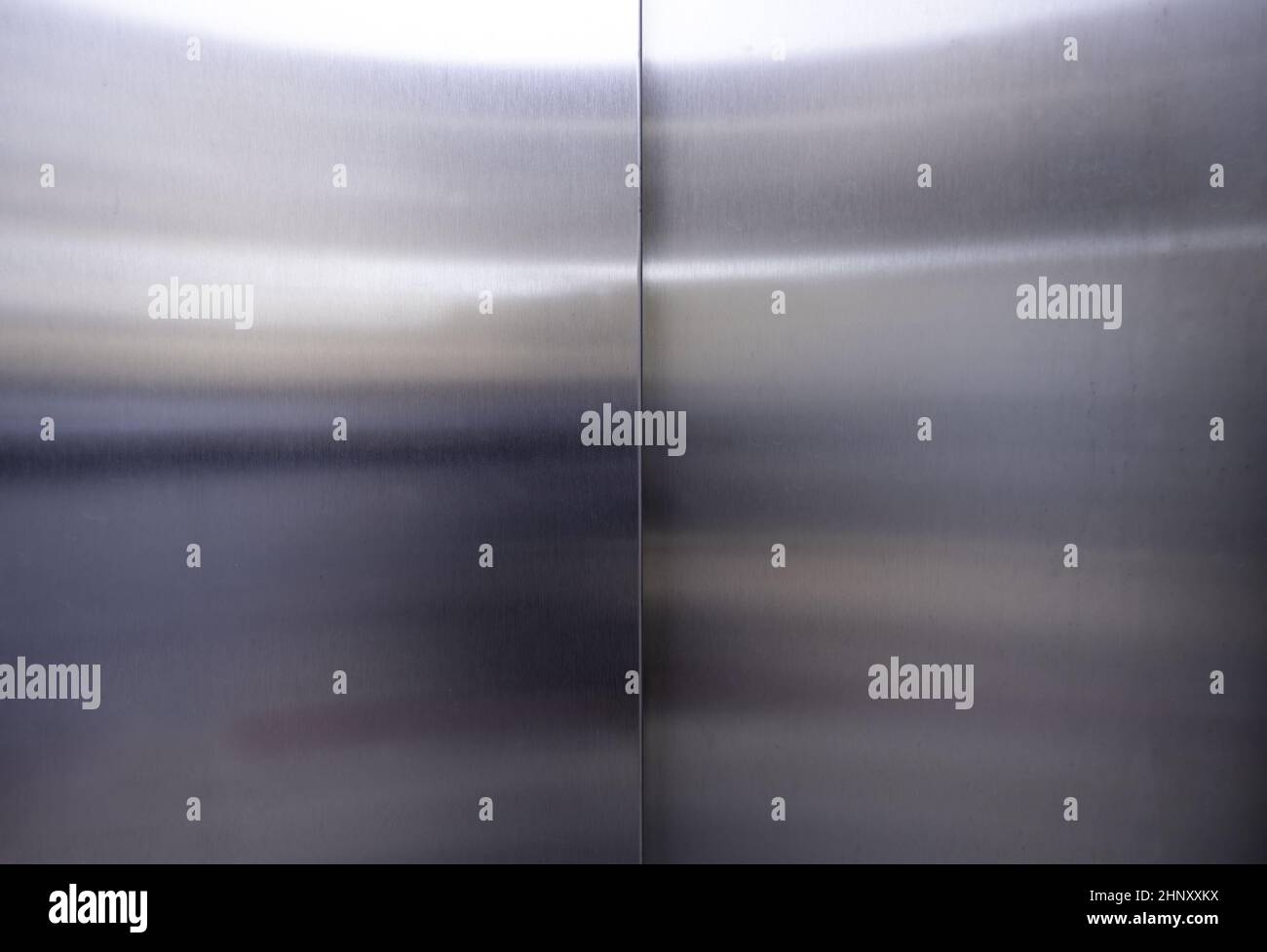 Shiny steel background detail, new elevator door Stock Photo - Alamy