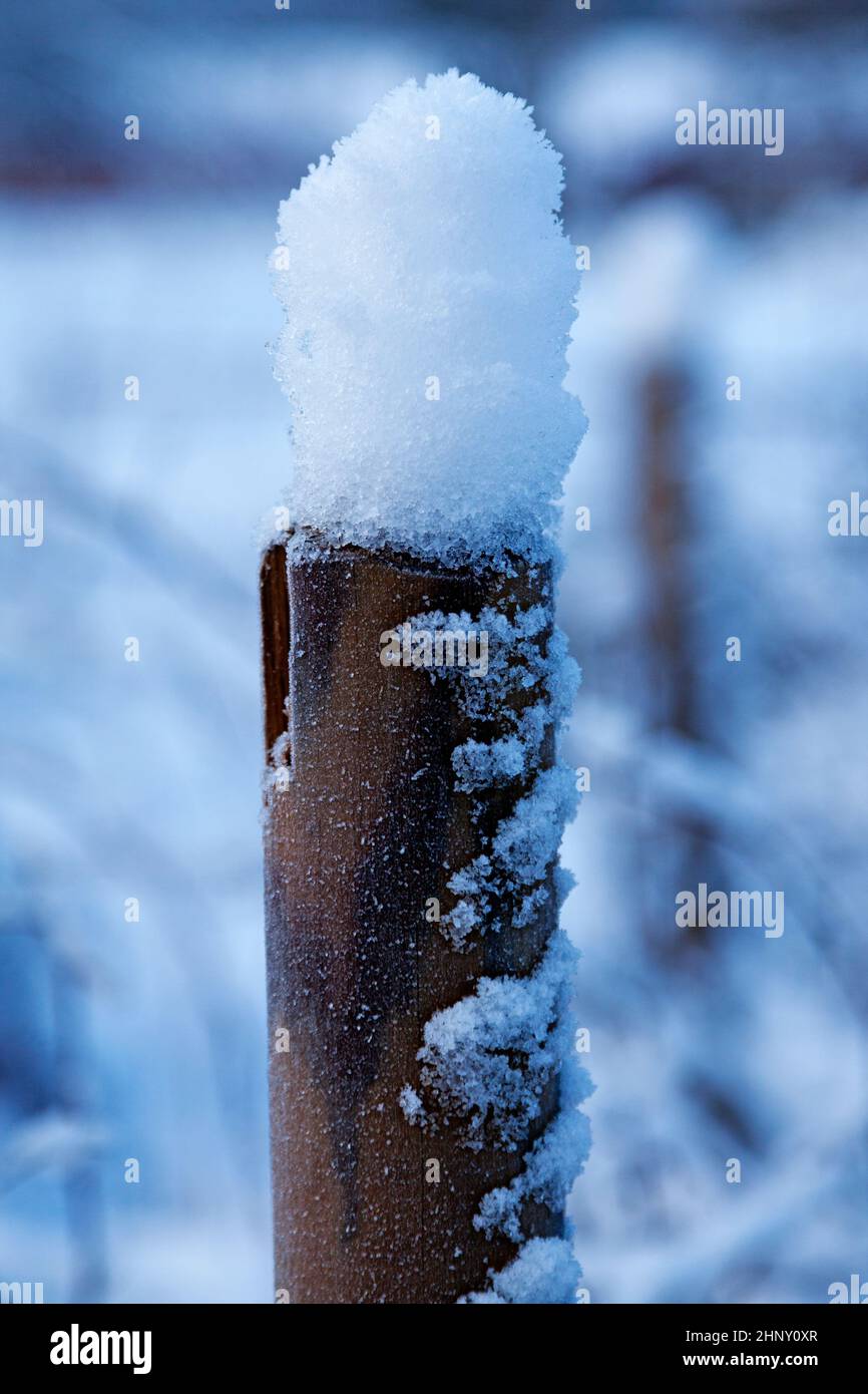 metal bar with wet snow on top Stock Photo - Alamy