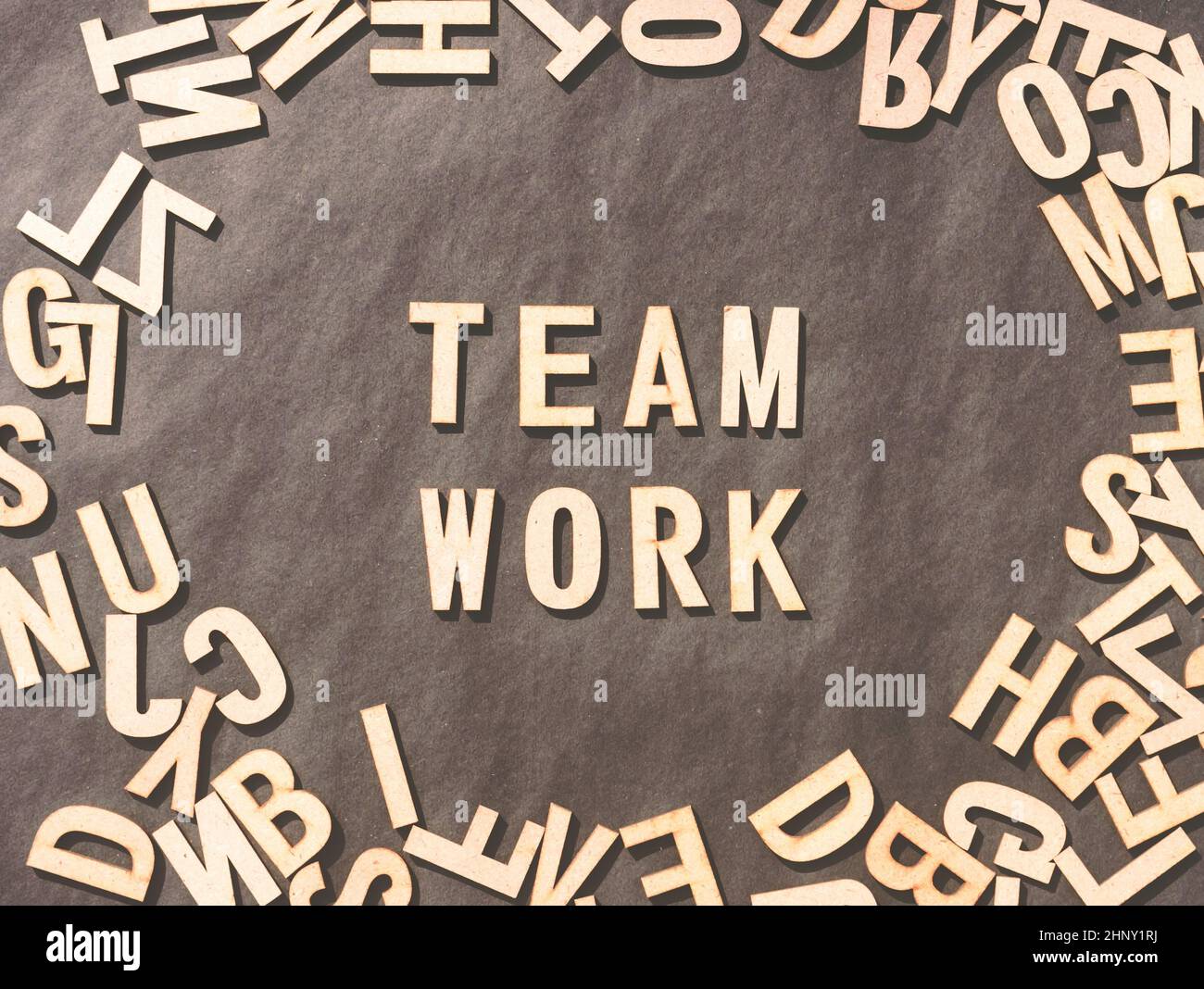 Team Work Word In Wooden Cube Alphabet Letters Top View On A rustic ...