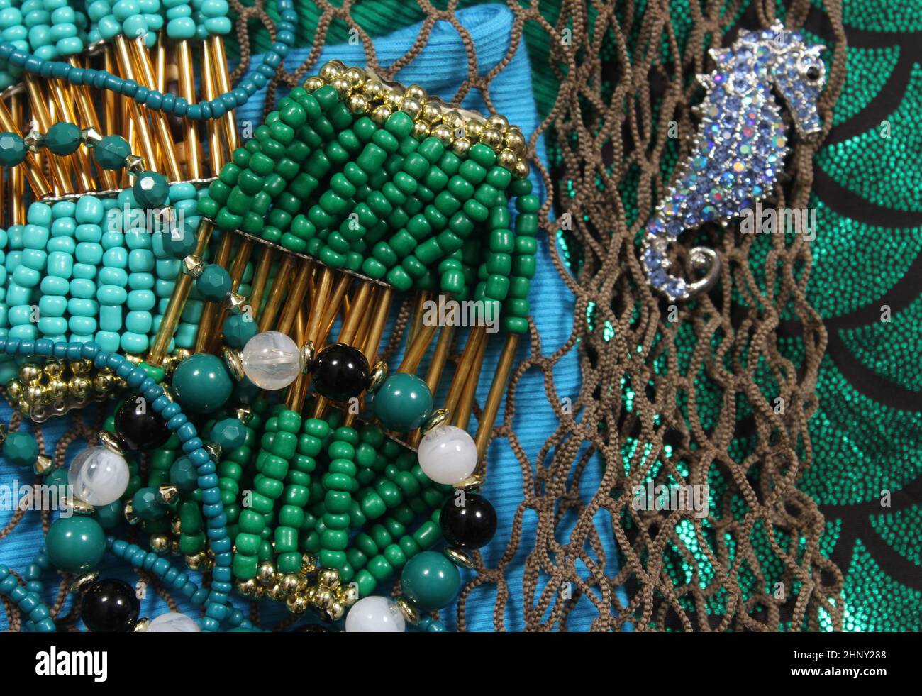 Mermaid Fashion With Jewelry and Fishing Net Stock Photo - Alamy