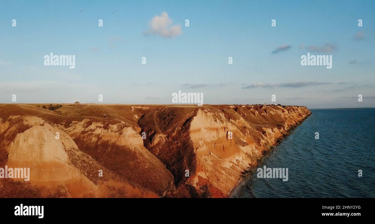 deep clay canyon overgrown with green grass Stock Photo - Alamy