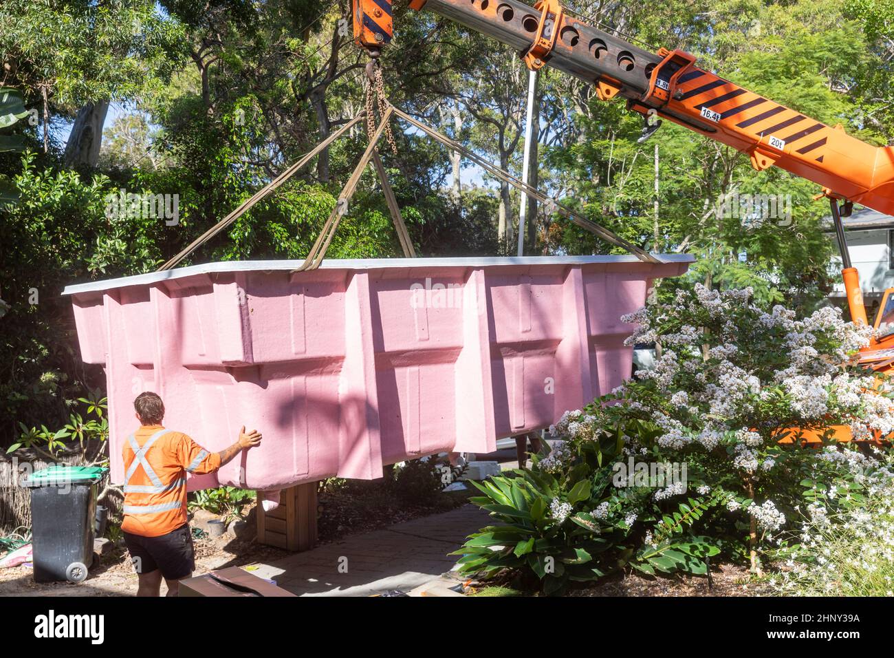 Crane lifting pool hi-res stock photography and images - Alamy