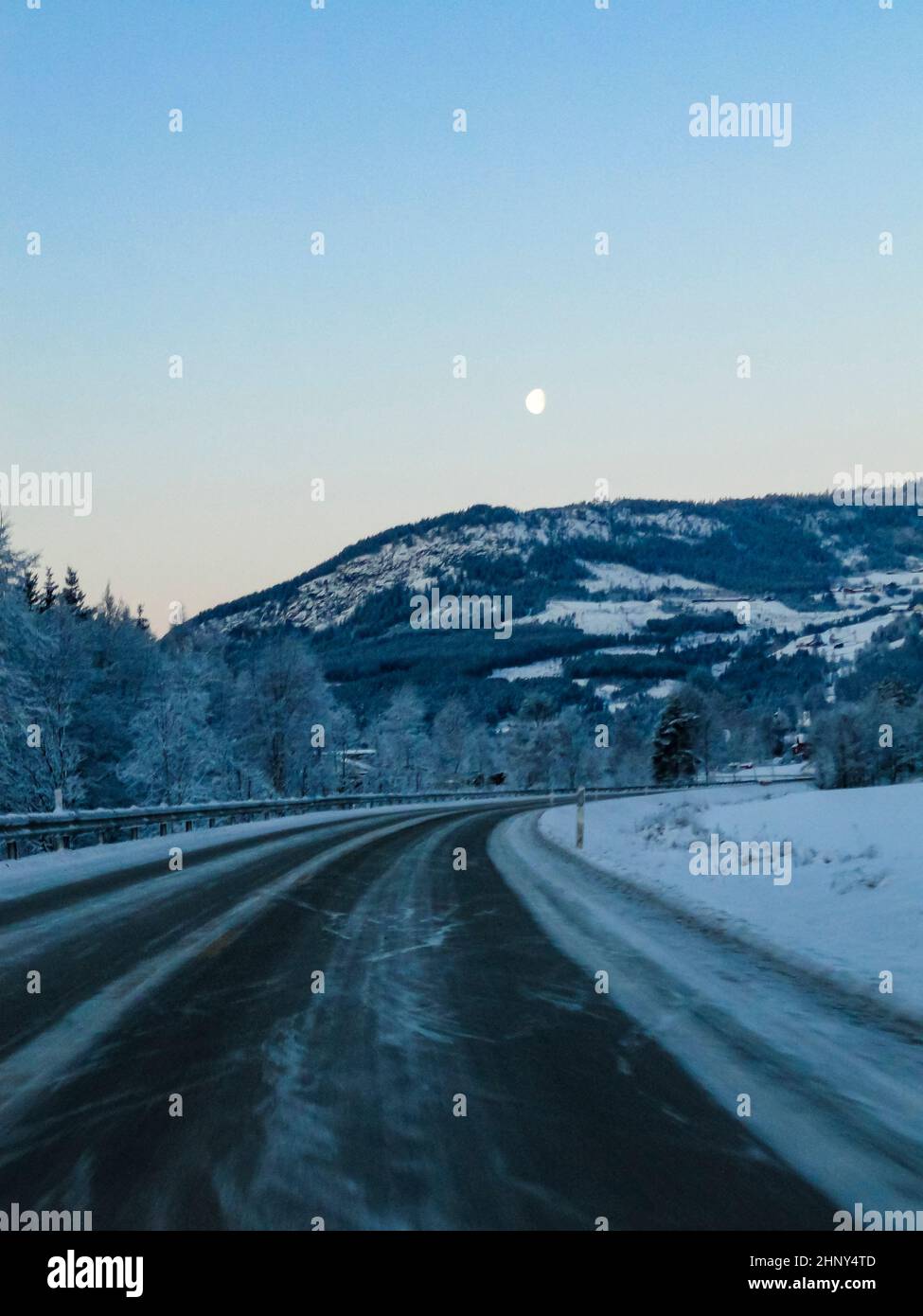 Driving fast at night through mountains and forests in Norway Stock ...