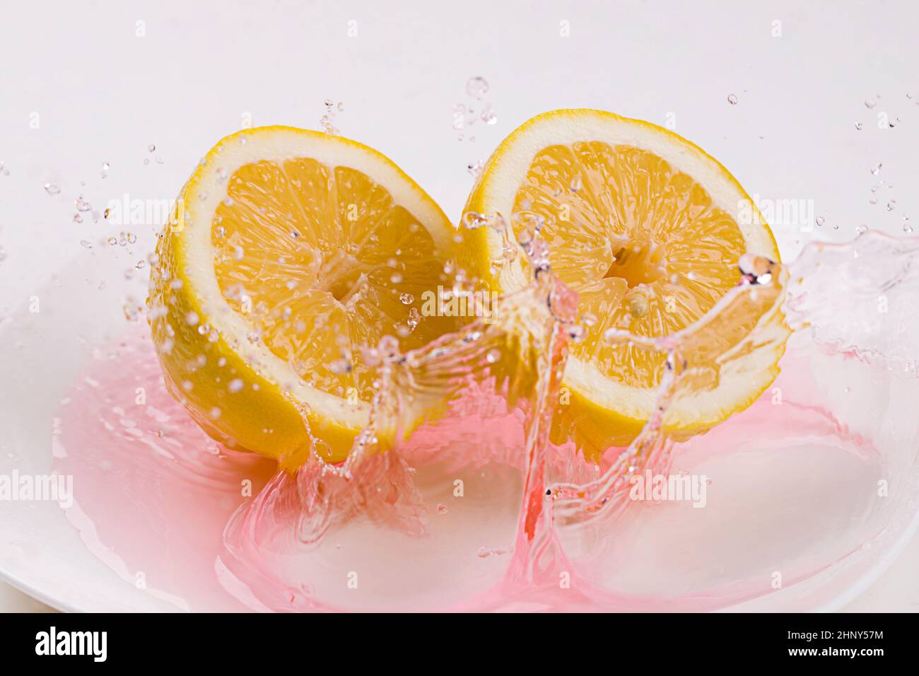 Halved fresh lemon halves two hi-res stock photography and images - Alamy