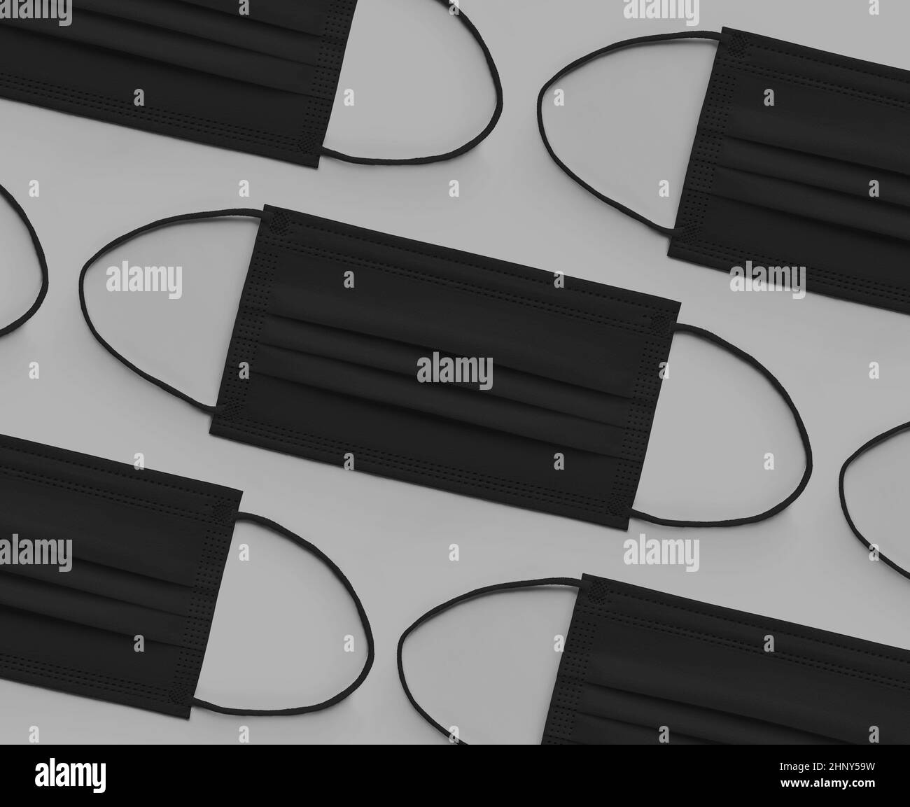 Mockup of a black surgical mask with ear loops, isolated on background ...