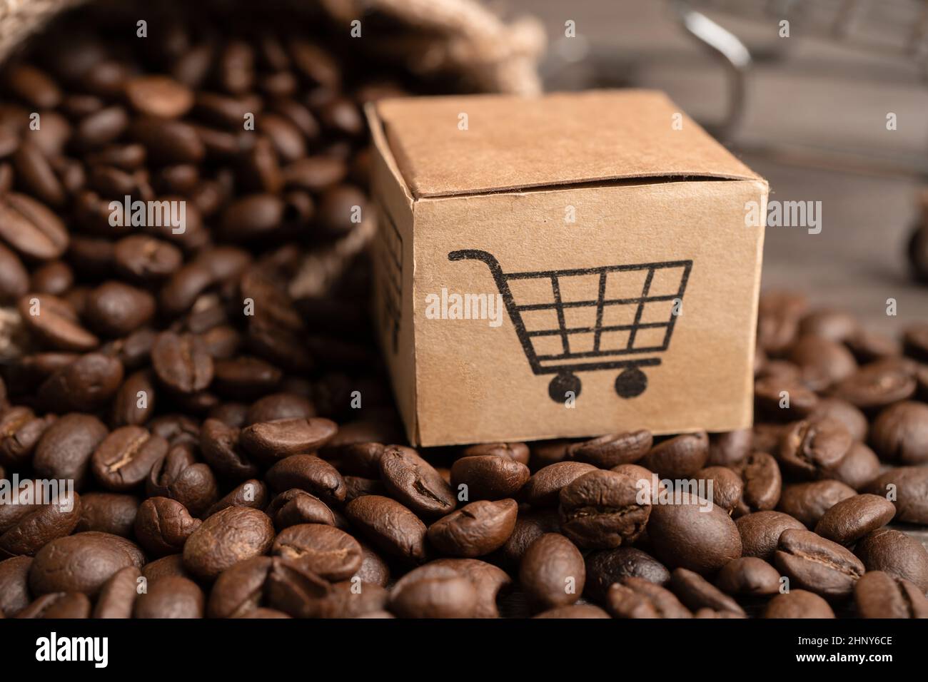 Box with shopping cart logo symbol on coffee beans, Import Export ...