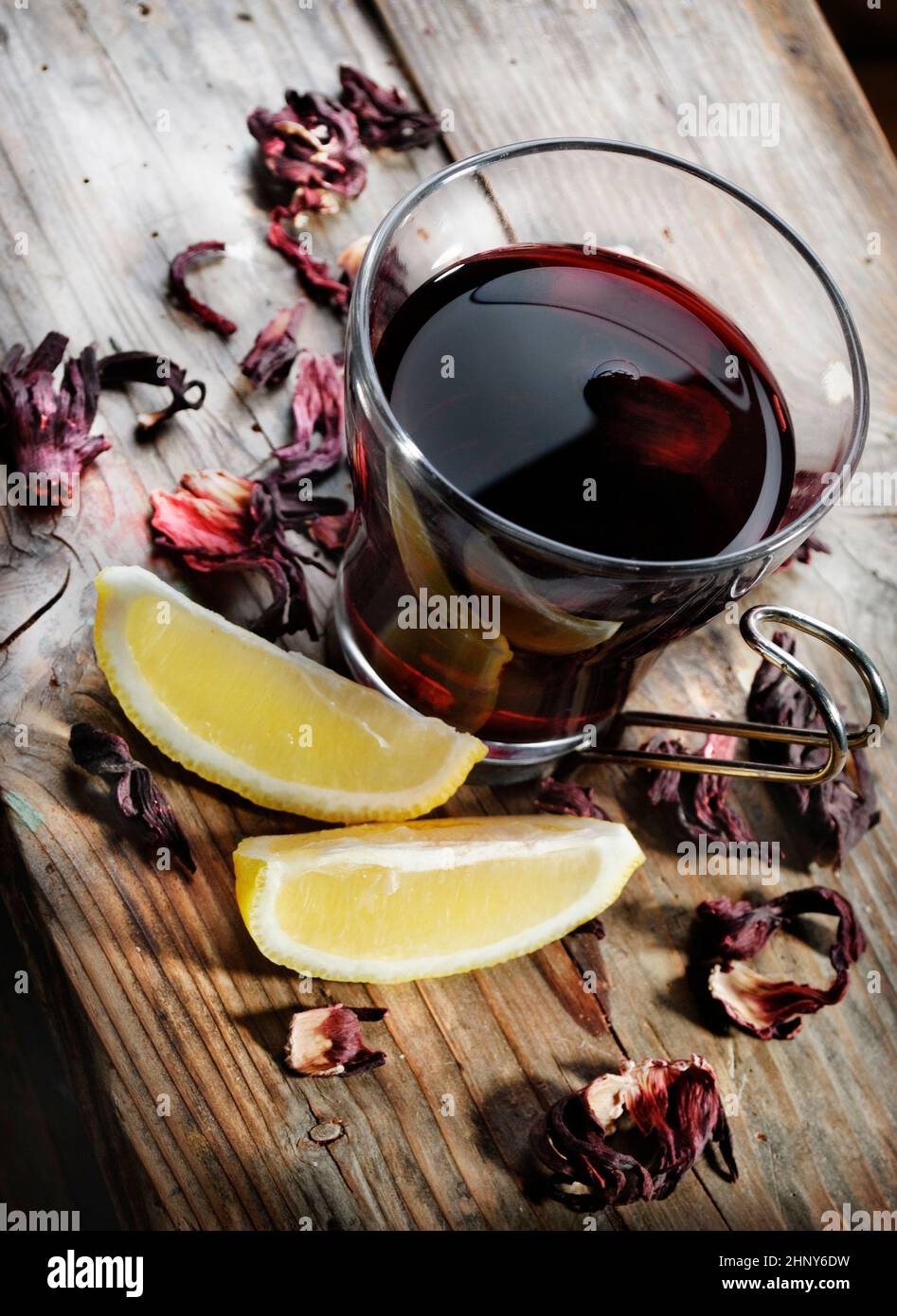 Cup of tea with dried hibiscus and lemon slices Stock Photo - Alamy
