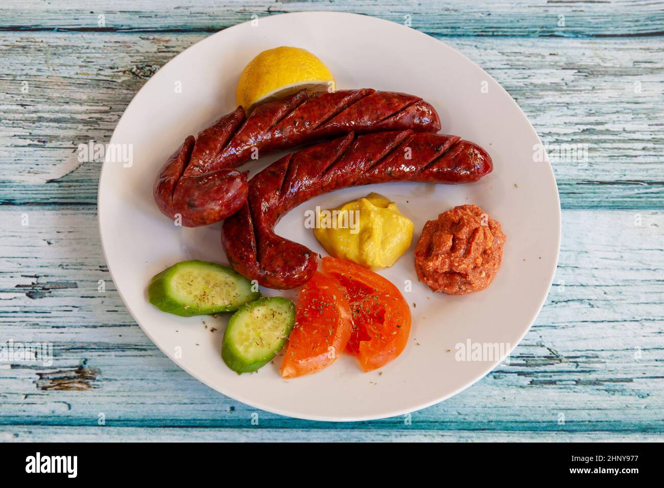 Greek Sausages Choriatiko grilled Stock Photo - Alamy
