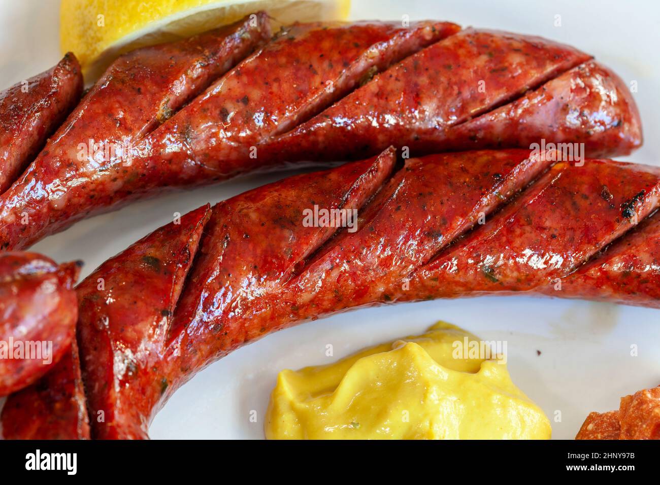 Greek Sausages Choriatiko grilled Stock Photo - Alamy
