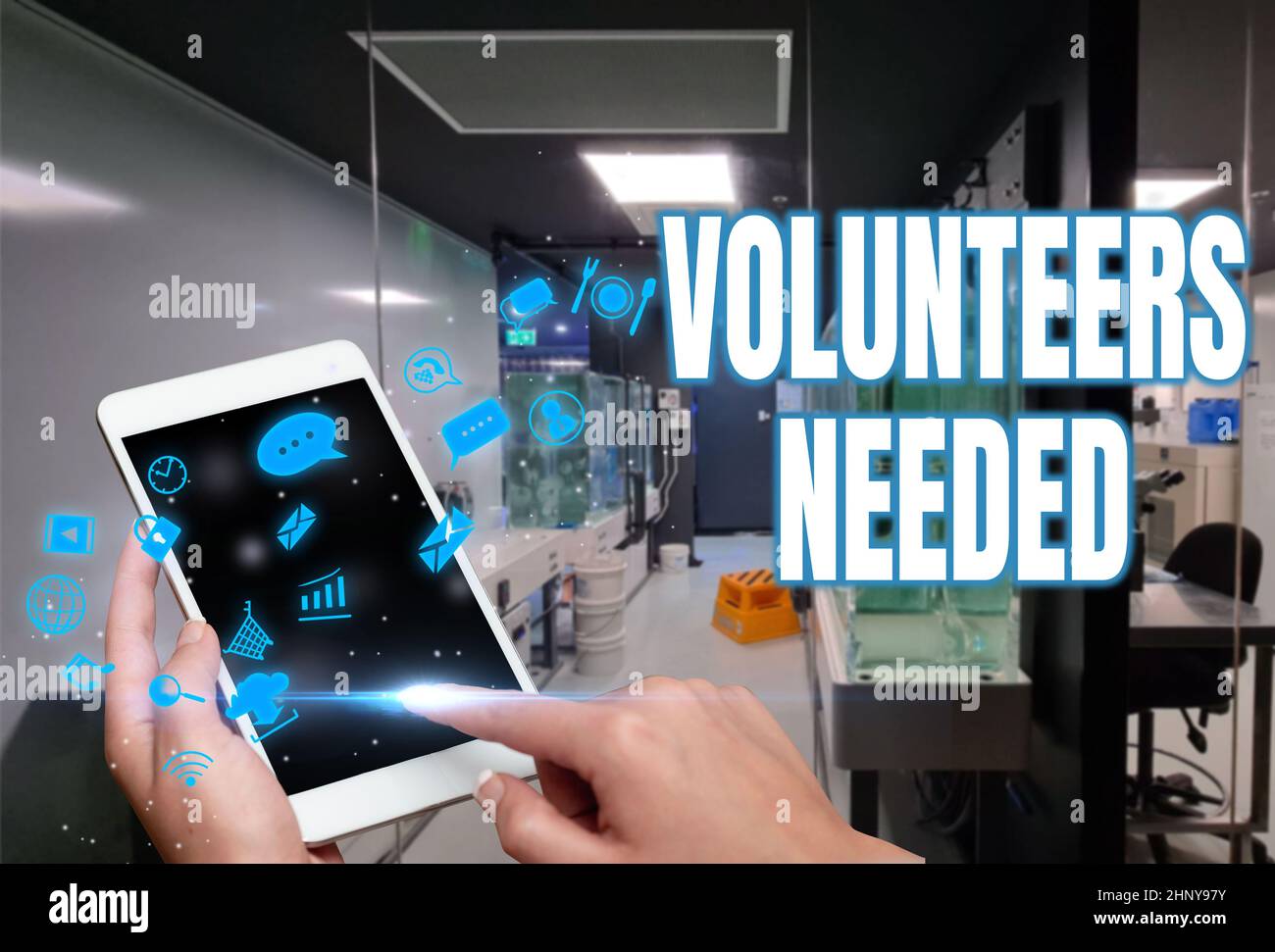 Hand writing sign Volunteers Needed, Word for need work or help for ...