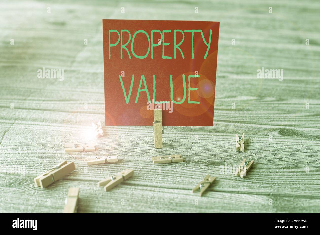 Hand writing sign Property Value, Business concept Worth of a land Real ...