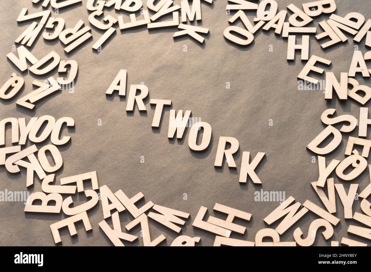 Artwork Word In Wooden Cube Alphabet Letters Top View On A rustic paper ...